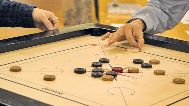 Learn the carrom double rules to enjoy carrom with friends in teams